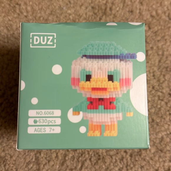 DUZ | Toys | Duz Magic Block Donald Duck | Poshmark